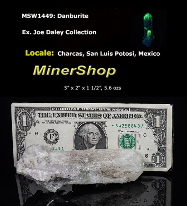 A danburite crystal fluorescent a bright green under midwave and ...